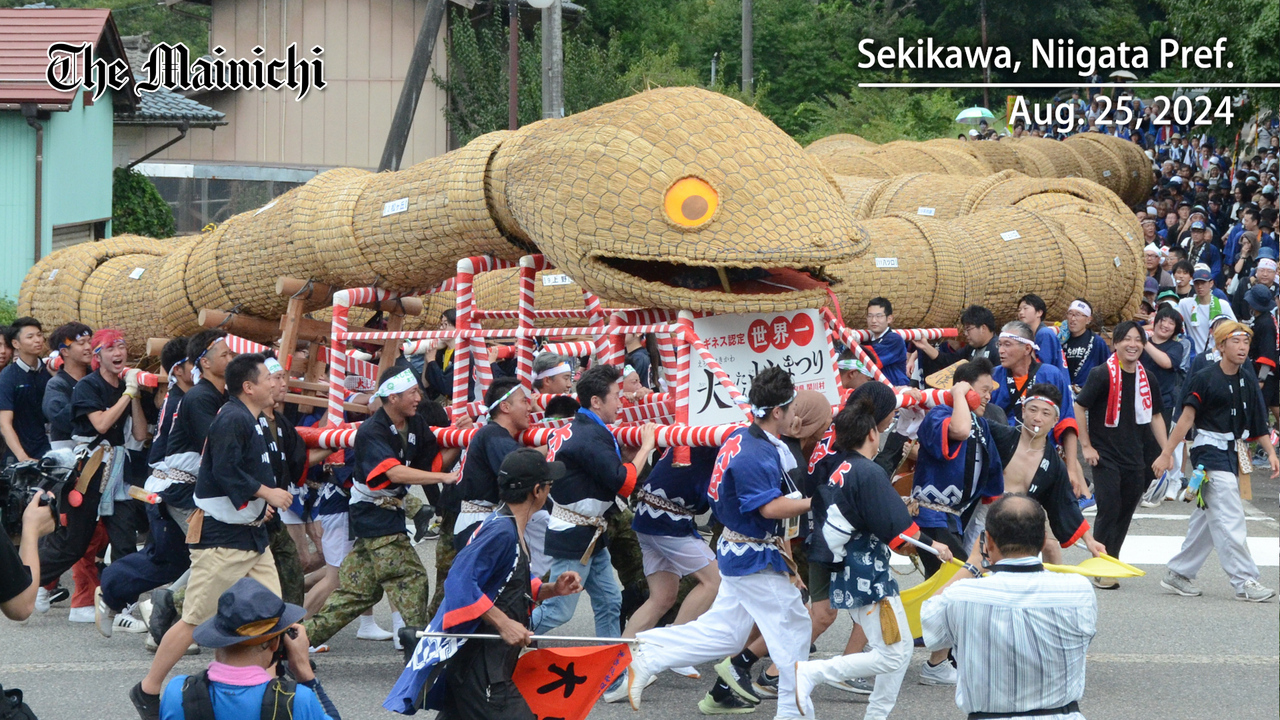 82-meter-long straw snake weaves through Japan village to commemorate ...